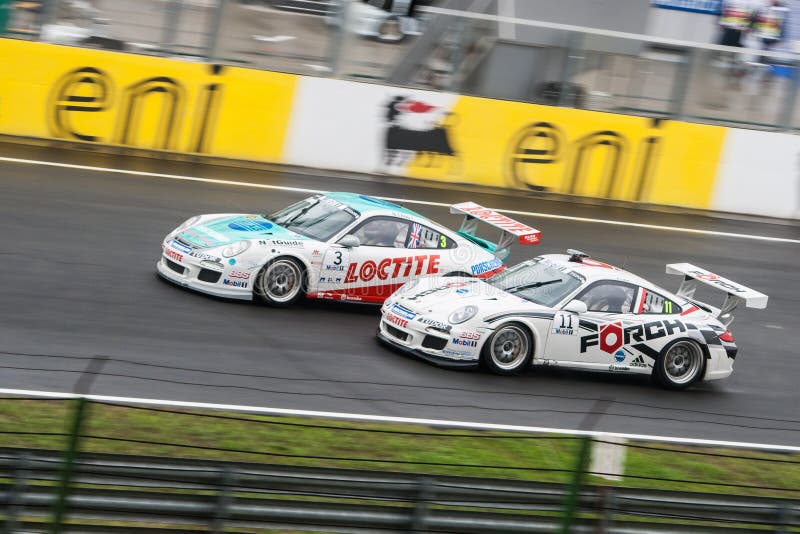 Porsche racing cars editorial photo. Image of sport, event - 27461156