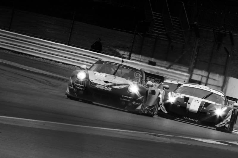 Porsche vs Ferrari editorial photo. Image of class, lights - 40870411