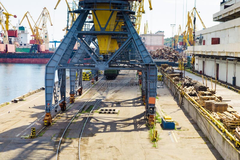 Port Cargo Crane Stands on the Rails Stock Image - Image of industrial ...