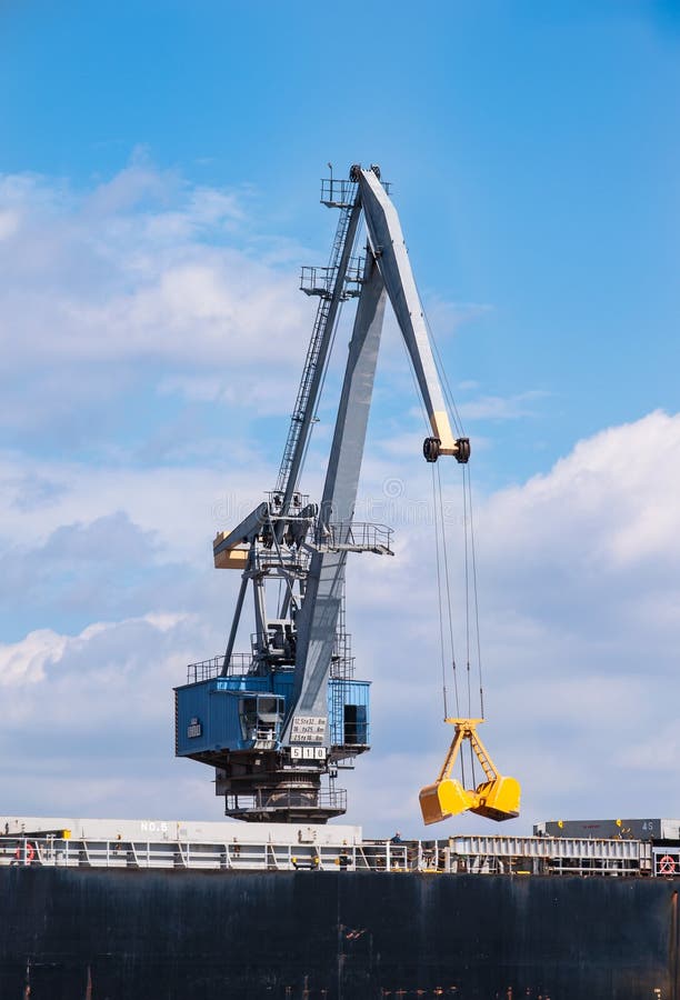 Port crane at work stock image. Image of work, ship, grab - 54393463