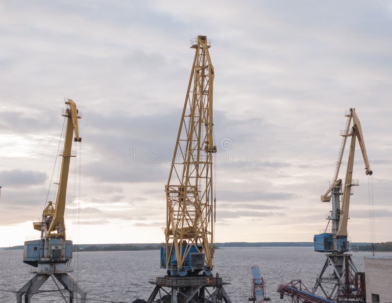 Port Cranes at the Port of Loading Platform. Stock Image - Image of ...