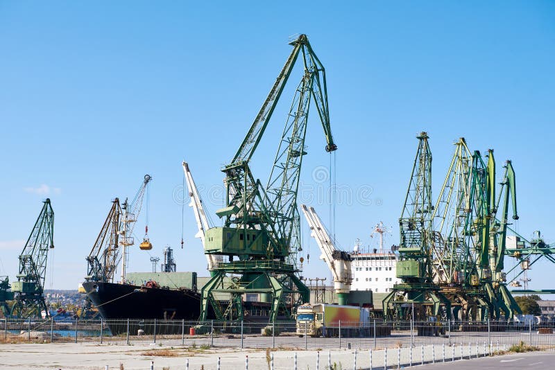 Port, cranes and ship stock photo. Image of pier, seaport - 259969562