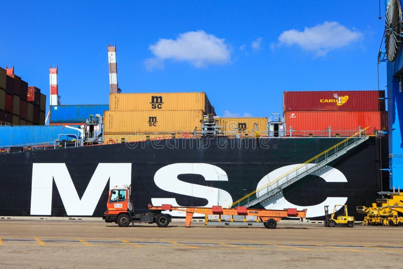 Port Dock with Container Ship and Various Brands and Colors of Shipping ...