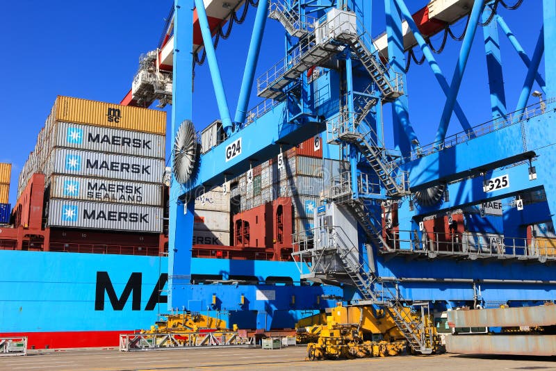 Port Dock with Container Ship and Various Brands and Colors of Shipping ...