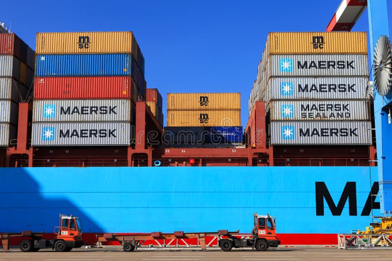 Port Dock with Container Ship and Various Brands and Colors of Shipping ...