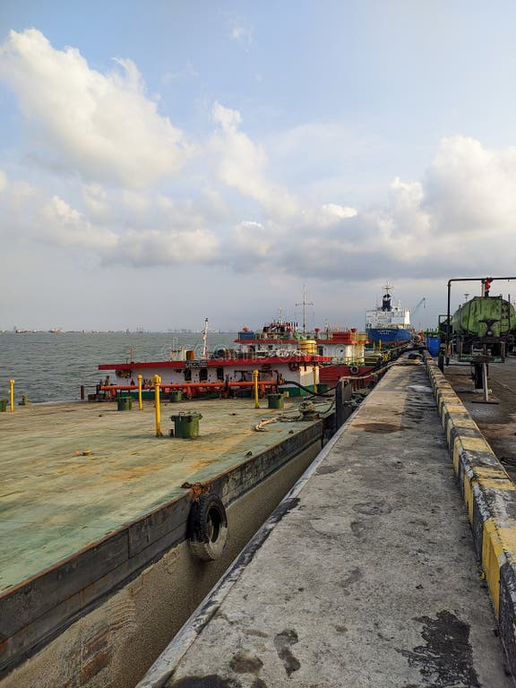 A Port in East Java Where Various Kinds of Goods are Loaded and ...