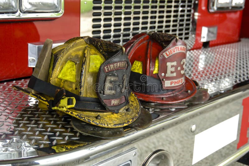 Fire Fighters Helmets Sit on the Front of a Fire Truck Editorial Image ...