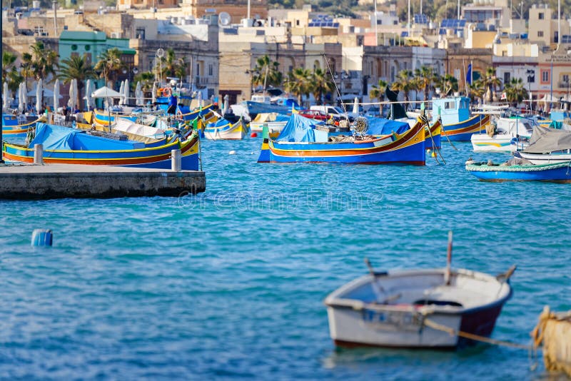 Port and Luzzu in Marsaxlokk, Malta Stock Photo - Image of ...