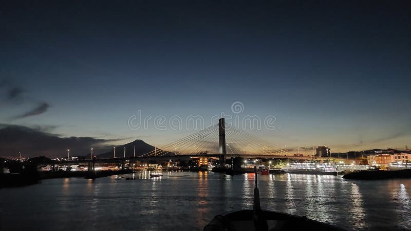 Port of Manado stock photo. Image of sunset, city, bridge - 261415202
