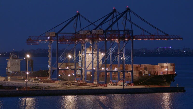 Loading a Ship with Containers at the Port. Sea Cargo Transportation ...