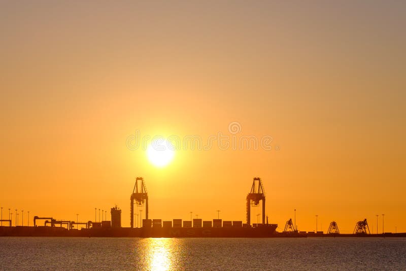 Port in the sunset stock photo. Image of dusk, shipping - 54815174
