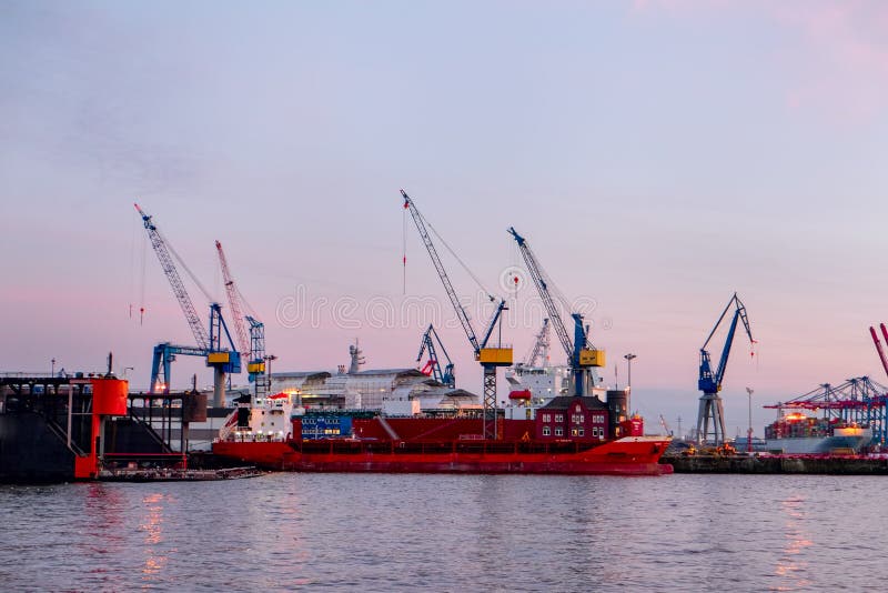 Port at sunset stock photo. Image of crane, water, harbour - 52057744