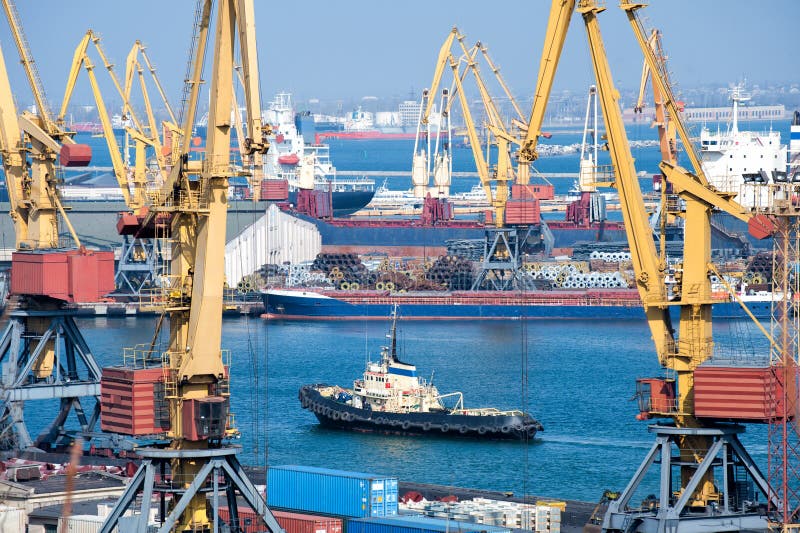Port with Tug Boat and Ships Stock Photo - Image of crane, port: 31449314