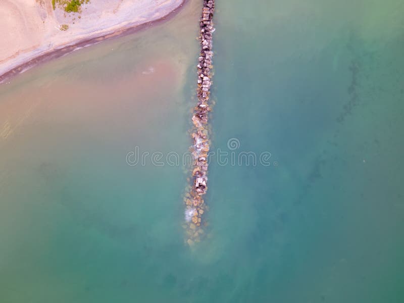Port West Beach Break Wall on the Ocean Stock Photo - Image of ocean ...