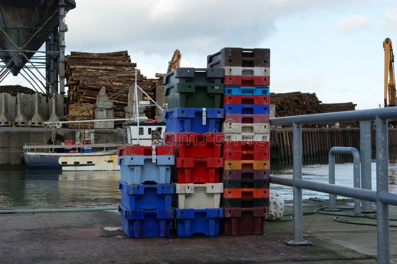 Port of Wicklow in Ireland. Colorful Stacks of Fish Boxes in the Harbor ...
