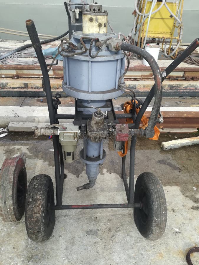 Portable Air Pump with Wheels Stock Photo - Image of pump, industrial ...