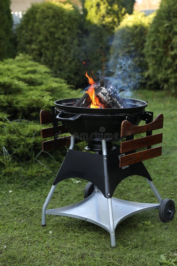 Portable Barbecue Grill with Fire Flames Outdoors Stock Image - Image ...