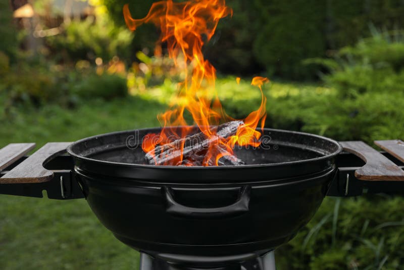 Portable Barbecue Grill with Fire Flames Outdoors, Closeup Stock Photo ...
