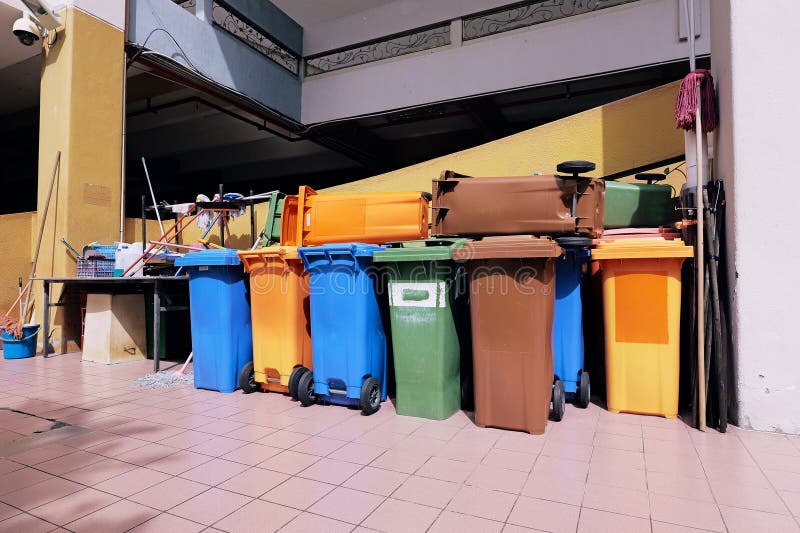 Portable Dustbins of Different Colors Being Kept in a Designated Spot ...