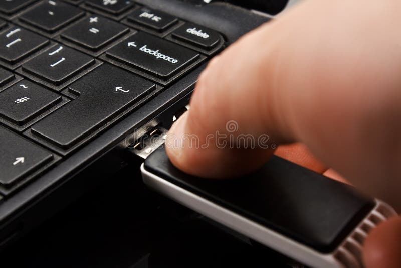 Plugging in the USB Cable stock photo. Image of digital - 22805118