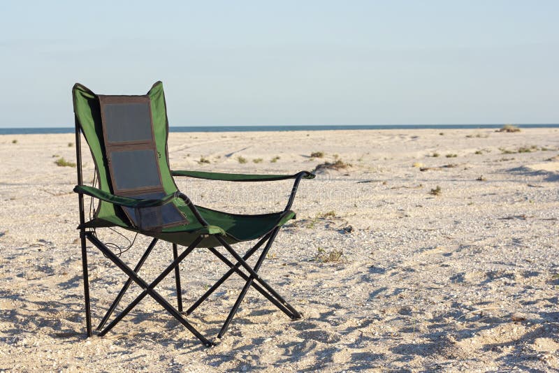 A Portable Foldable Solar Panel Hangs on a Travel Chair. Tourist ...