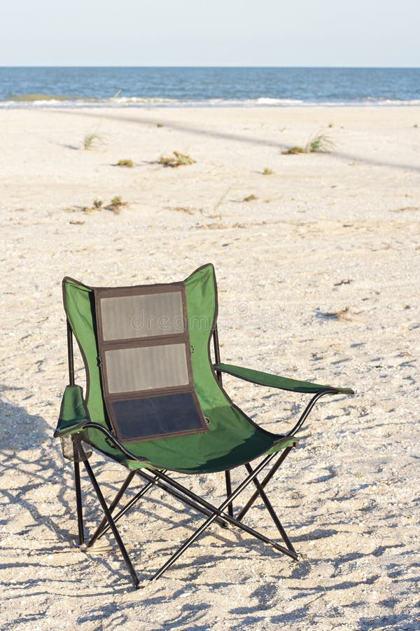 A Portable Foldable Solar Panel Hangs on a Travel Chair. Tourist ...