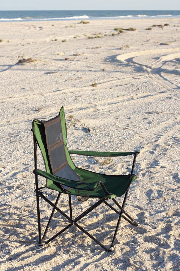 A Portable Foldable Solar Panel Hangs on a Travel Chair. Tourist ...