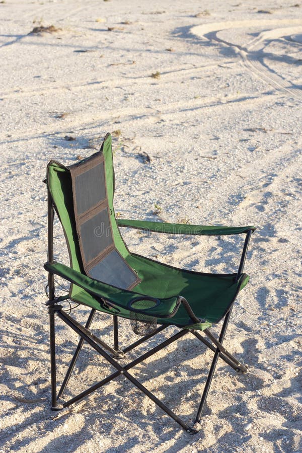A Portable Foldable Solar Panel Hangs on a Travel Chair. Tourist ...