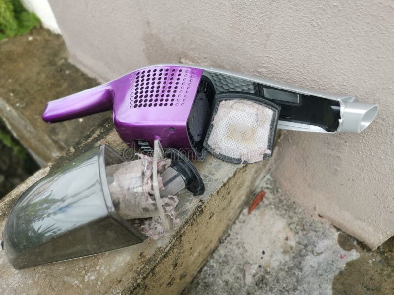 Portable Hand Vacuum Cleaner with Dirt Collection. Stock Photo - Image ...