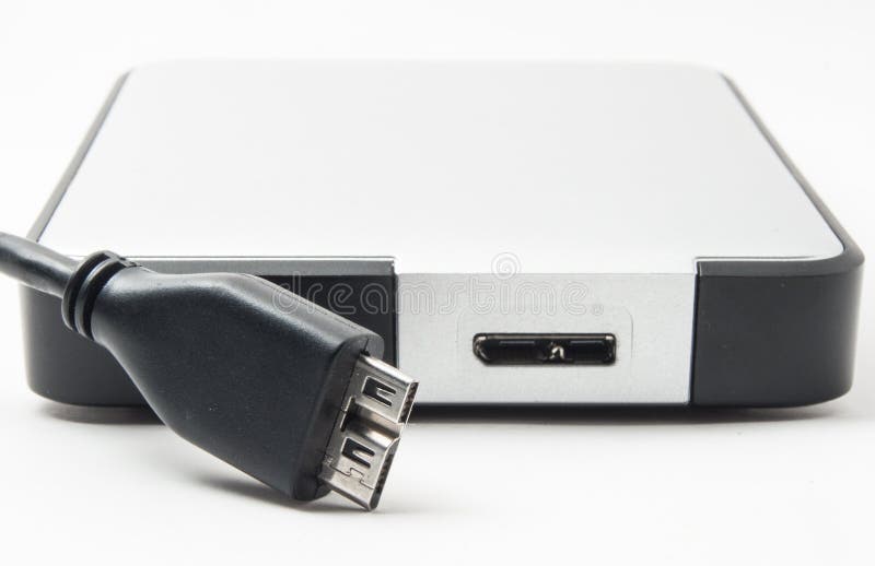 Portable Hard Disk with USB 3.0 Connectivity and Wire on a White Stock ...