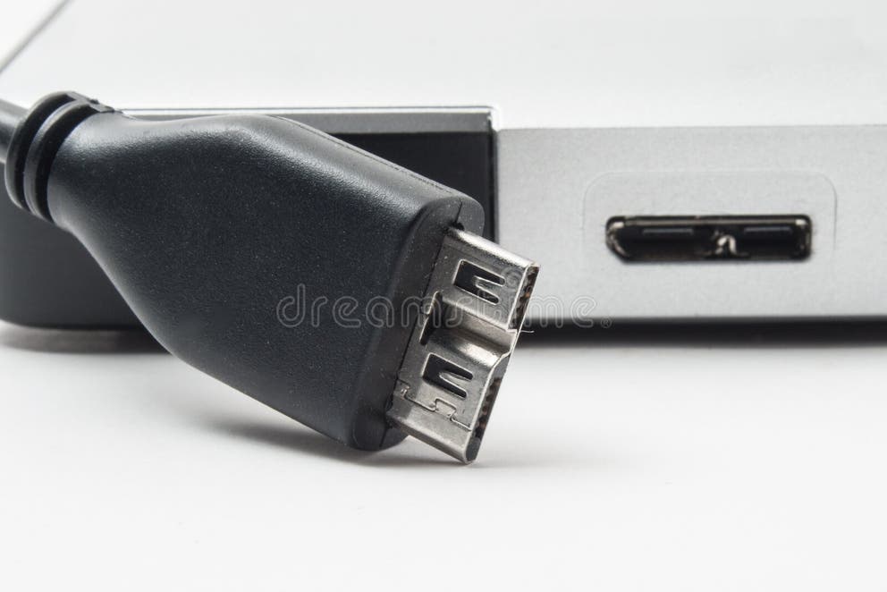 Portable Hard Disk with USB 3.0 Connectivity and Wire on a White Stock ...