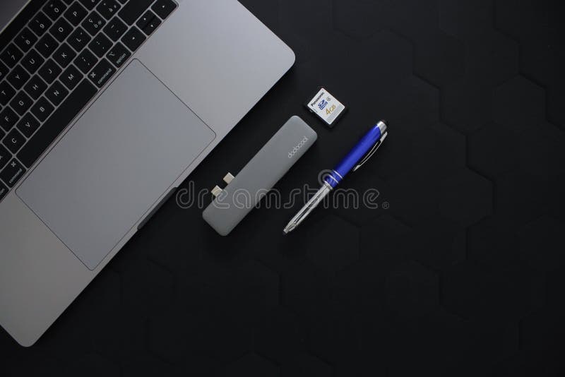 Portable Modern Silver Computer On A Black Background. Editorial ...