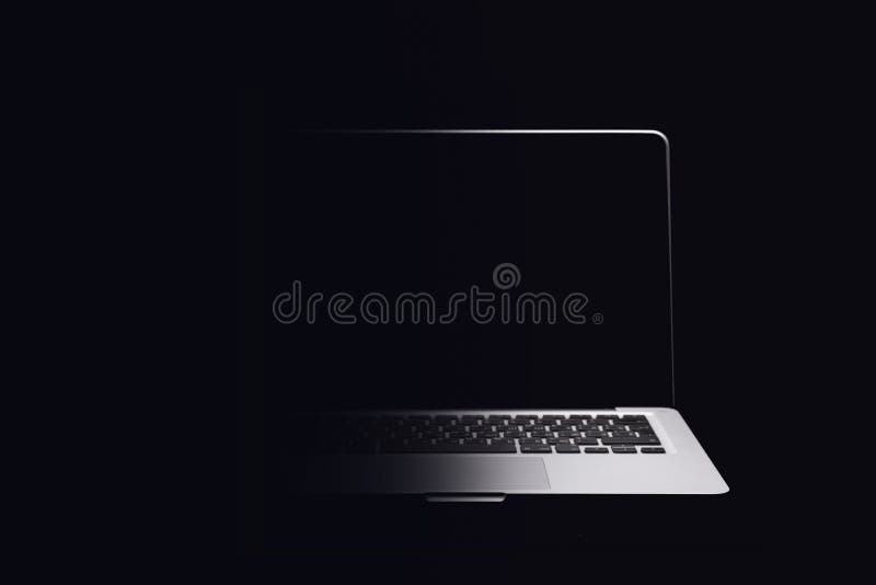 Portable Modern Silver Computer on a Black Background. Editorial ...