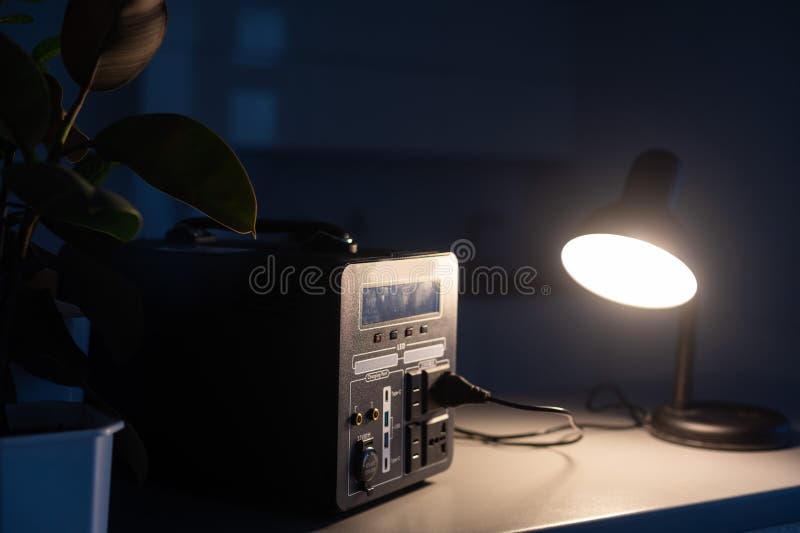 Portable Power Station Charging Gadgets Near Wall Stock Photo - Image ...