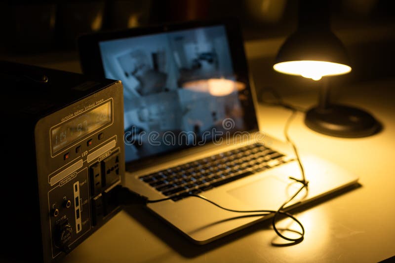 Portable Power Station Charging Gadgets Near Wall Stock Photo - Image ...