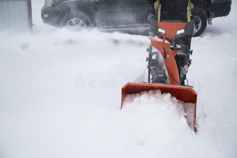 A Portable Snow Blower Powered by Gasoline. Snow Removal in Winter ...