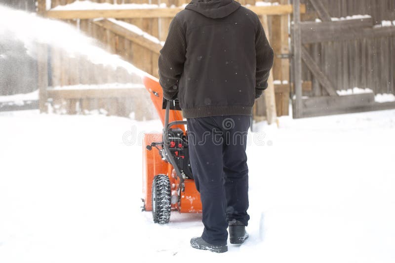 A Portable Snow Blower Powered by Gasoline. Snow Removal in Winter ...