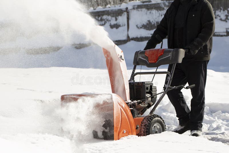 A Portable Snow Blower Powered by Gasoline. Snow Removal in Winter ...