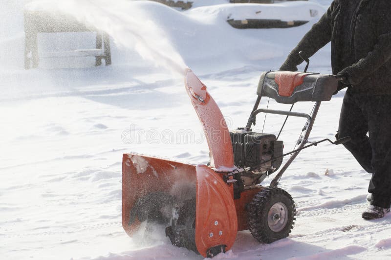 A Portable Snow Blower Powered by Gasoline. Snow Removal in Winter ...