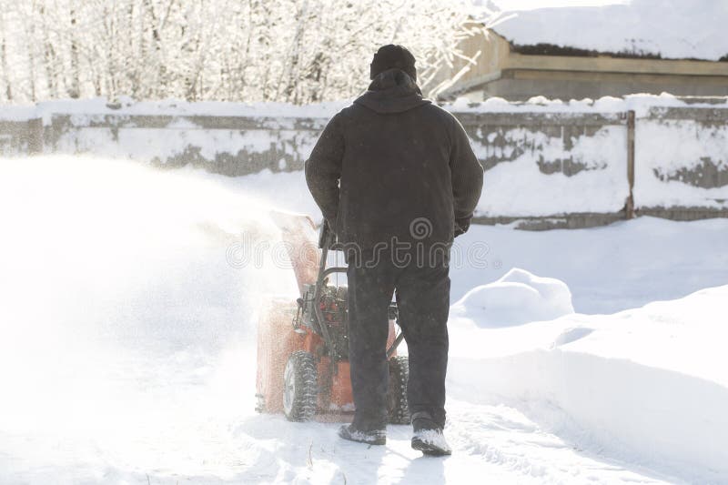 A Portable Snow Blower Powered by Gasoline. Snow Removal in Winter ...