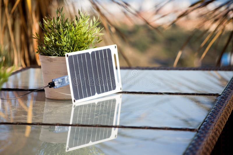 Portable Solar Panel on a Glass Table Stock Image - Image of clean ...