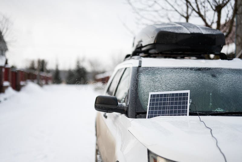 Portable Solar Panel on SUV Car at Winter Stock Image - Image of power ...