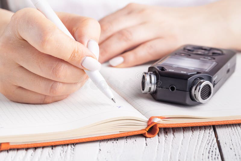 Portable Sound Recorder on Notebook with Pen. Memo and Planning Concept ...