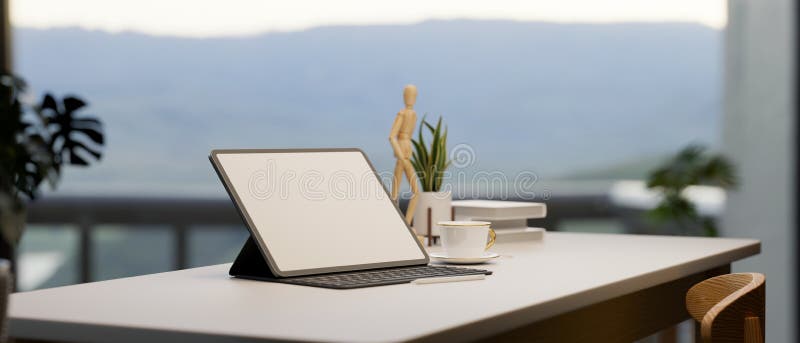 Tablet Mockup with Wireless Keyboard on Table in Modern Dark Co-working ...