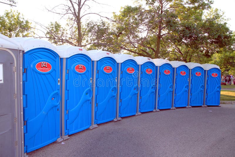Four portable toilets stock image. Image of portable - 14807355