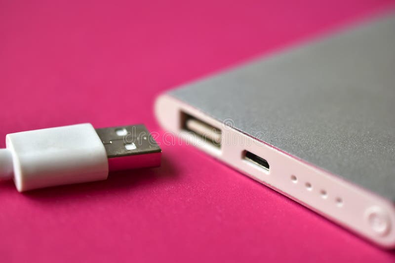 Portable USB Charger for Phones with USB and Micro Connector Stock ...