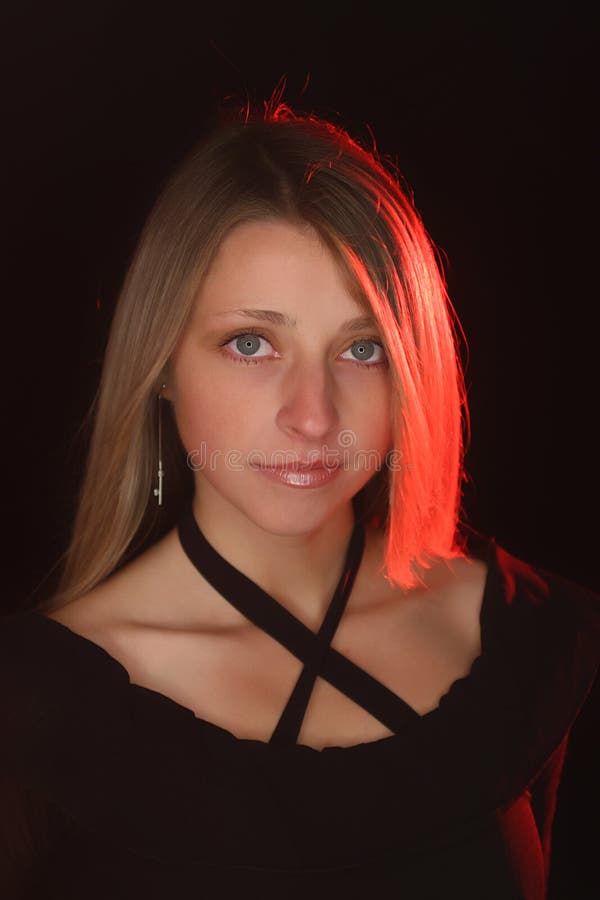 Portait of a Beautiful Girl Made with Ring Light and Some Red Backlight ...