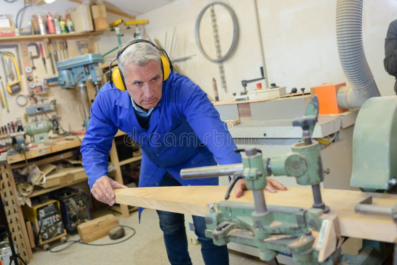 Portait Senior Woodworker Using Machinery Stock Photo - Image of ...