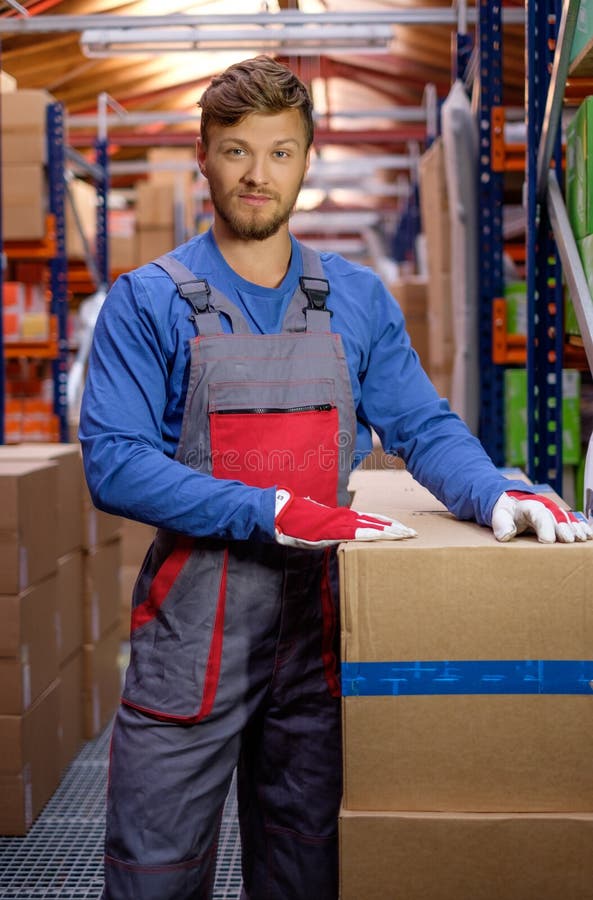 Porter carrying boxes stock photo. Image of loader, depot - 61744200