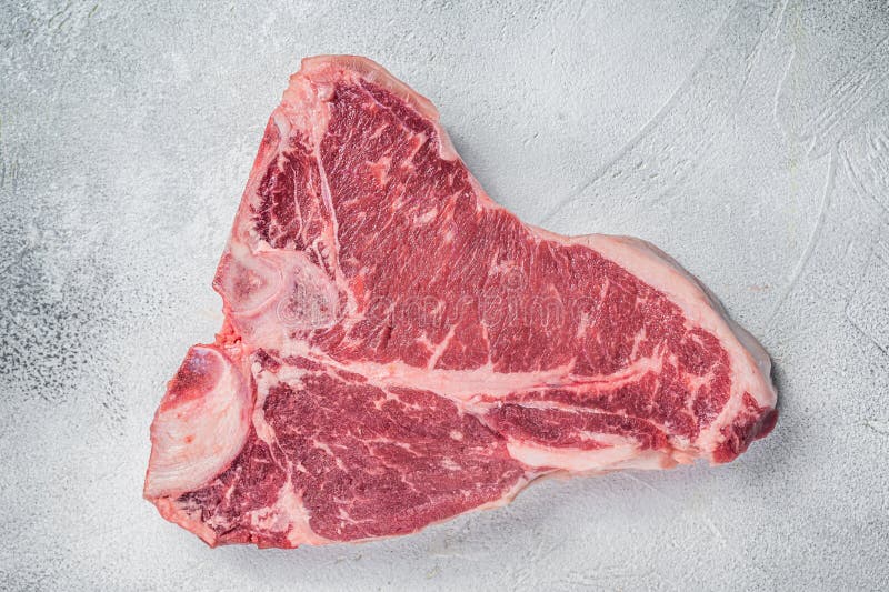 Porterhouse T-bone Raw Beef Meat Steak. White Background Stock Photo ...
